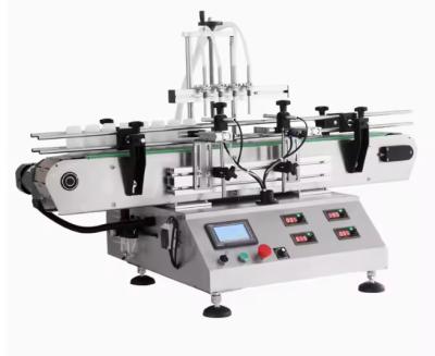 China Máquina de Llenado de Líquidos de Escritorio Automática Pequeña para Aceite Esencial, Perfume, Llenado, Tapado y Etiquetado de Botellas con 4 Cabezales en venta