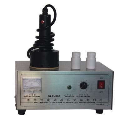 Китай Новый тип ГЛФ-300 Индукционный герметизатор алюминиевой фольги, Пластиковый герметизатор шрубной нитки, Портативный герметизатор круглой крышки бутылки продается