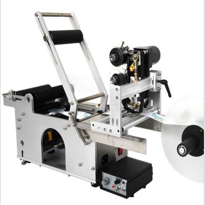 China Professional Manual Bottle Labeler Machine Label Applicator with Hot Stamp Coder for sale