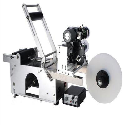 China Professional Manual Bottle Labeler Machine Label Applicator with Hot Stamp Coder for sale