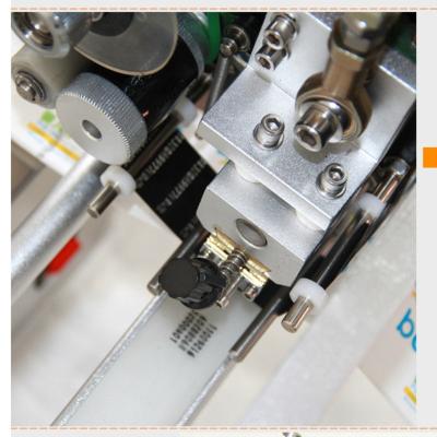 China Professional Manual Bottle Labeler Machine Label Applicator with Hot Stamp Coder for sale