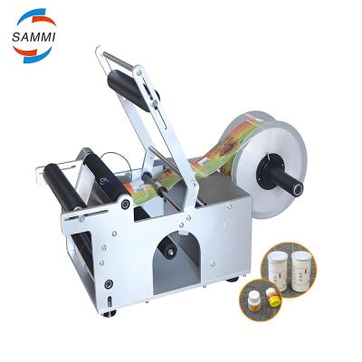 Cina Etichettatrice manuale rotonda per bottiglie di alta qualità MT-50 con interruttore a pedale in vendita