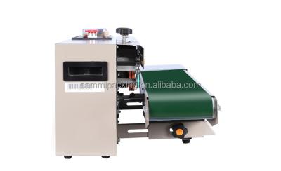 China Semi-Automatic Horizontal Bag Sealing Machine Electric Manual Driven Heat Sealing for Cartons Foil Includes Batch Date Printing for sale