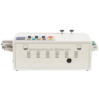 China Semi-Automatic Horizontal Bag Sealing Machine Electric Manual Driven Heat Sealing for Cartons Foil Includes Batch Date Printing for sale