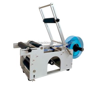 Cina MT-50 Etichettatrice semiautomatica per bottiglie rotonde, macchina etichettatrice per lattine e bottiglie di bevande in vendita