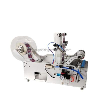 Cina Etichettatrice semiautomatica a basso prezzo per bottiglie rotonde a doppia faccia per barattoli di vetro e lattine in vendita