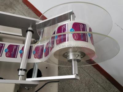 Cina Etichettatrice semiautomatica a basso prezzo per bottiglie rotonde a doppia faccia per barattoli di vetro e lattine in vendita
