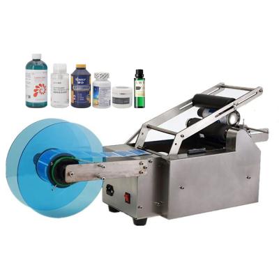 China Small Desktop Bottle Packaging Labeling Machine Automatic Round Bottle Labeling Machine Instead of Manual Labelle Machine for sale