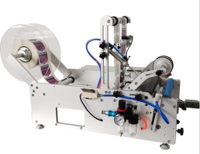 China Máquina de etiquetado de doble cara de alta calidad, aplicador de etiquetas de envoltura de mesa para tanques redondos/botellas con función de conteo en venta