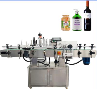 China 2024 Sales in China Reliable Semi-Automatic Cylinder Labeling Machines Electric Driven with PLC Components Wood Carton Packaging for sale