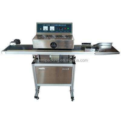 China Máquina selladora por inducción automática continua de tipo suelo LGYF-2000B de alta calidad en venta