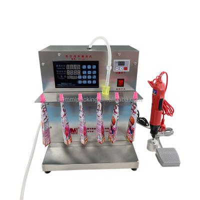 China Cheap Price Stand up Plastic Spout Pouch Bag Filling Machine Mini Doypack Filler With a Capper for sale