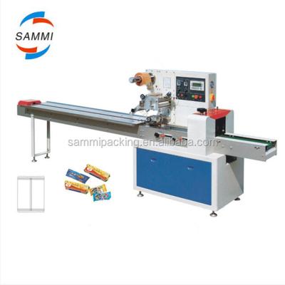 Китай Многофункциональная горизонтальная упаковочная машина для подушек: печенье, шоколадные батончики, напитки. Основная функция: формование, наполнение, запайка, продольная резка. продается