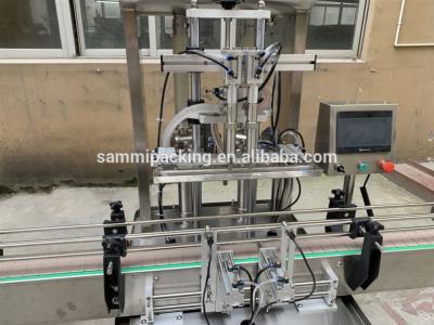 China 4 Nozzles Automatic Straight Line High Speed Piston Type Inline Overflow 1-5L Wine Liquid Bottled Water Filling Machine for sale