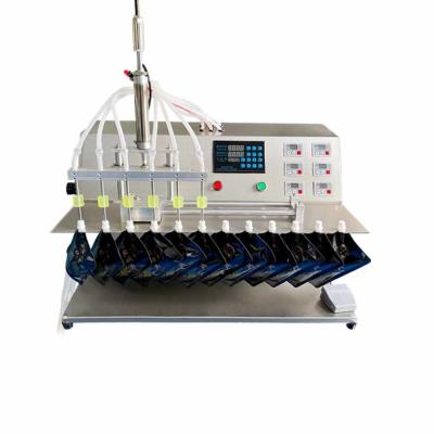 China 2025 New Double Nozzles Liquid Water Spout Pouch Bag Filling Machine Stand up Nozzle Bag Semi Automatic  Filler and Sealer for sale