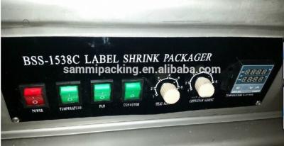 Cina Macchina di imballaggio termoretraibile per sigillo di tappi di alta qualità / Macchina per etichettatura a manicotto termoretraibile per tappi di bottiglia Macchine per l'imballaggio in legno Cinghia, imballaggio in lamina in vendita