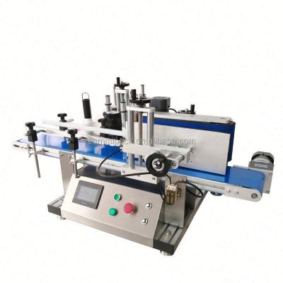 China Semi-Automatic Round Bottle Labeling Machine with PLC Touch Screen and 1 Year Warranty for High Accuracy Space Saving Operation for sale