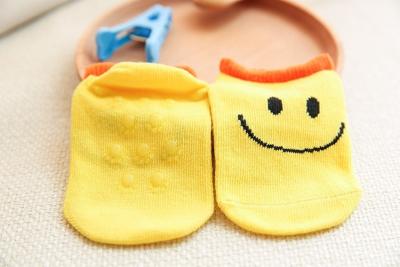 China Soft touch jacquard cartoon design non slip newborn baby grips cotton socks for sale