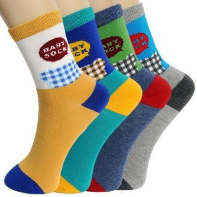 China Hot selling fashionable jacquard cosy sports cotton mid calf boys socks for sale
