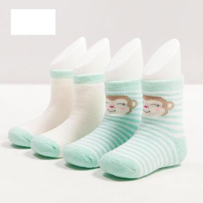 China High quality custom jacquard lovely cartoon design knitted cozy cotton terry baby socks for sale