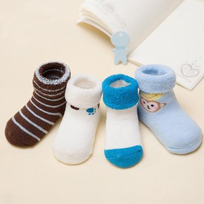 China Fashionable high quality custom design knitted winter thick cozy cotton terry baby socks for sale