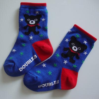 China Custom jacquard logo cartoon design knitted cozy mid calf baby socks for sale