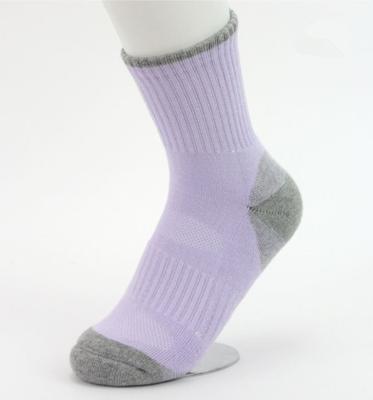 China Plain color crew cosy mid calf bamboo cushioned sports women socks for sale
