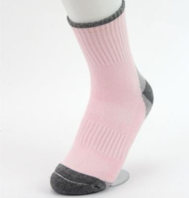China Solid color crew cosy mid calf bamboo cushioned sports women socks for sale