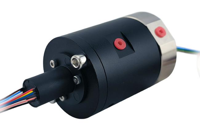 Side view of gas-electric slip ring showing connection ports and housing