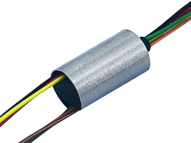 Side view of 6.5mm micro capsule slip ring showing wire connections