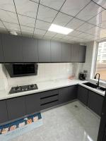 China Modern White Flat Panel MFC Melamine Customized Kitchen Cabinets for sale