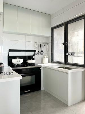 China Armário de cozinha de melamina em forma de L com balcão de quartzo à venda