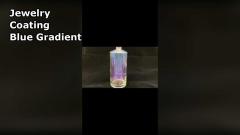 Cosmetics glass bottle with vacuum-coated blue gradient effect