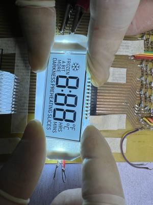 China TN LCD Display with White LED Backlight 50.4x26.4mm 12 Pins for Kitchen Appliances for sale