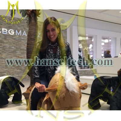 中国 Hansel Best seller Motorized Plush Riding Animals Stuffed Animals With Battery Coin Toys 販売のため