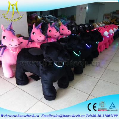 中国 Hansel battery operated coin op game ride electric toys amusement park stuffed animal unicorn on wheels for sales 販売のため