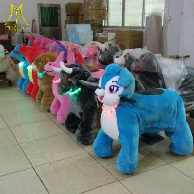 中国 Hansel electric rideable animal coin operated dragon ride walking family entertainment center riding cow toys for kids 販売のため