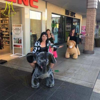 中国 Hansel amusement park motorized animal baby toy ride on walking animals 販売のため
