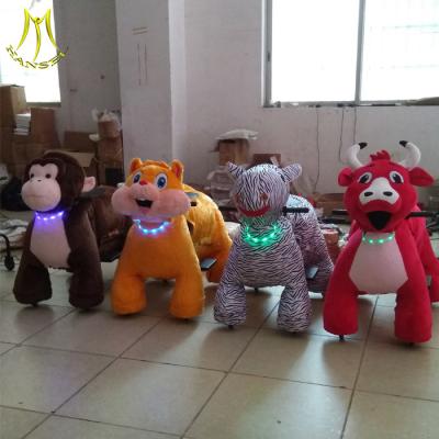 China Hansel funny kids ride on plush rocking horse for park coin operated zebra ride for sale
