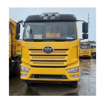 Cina 1000Nm-1500Nm FAW camion a gomma LHD 8*4 40 tonnellate Sinotruk camion a gomma in vendita