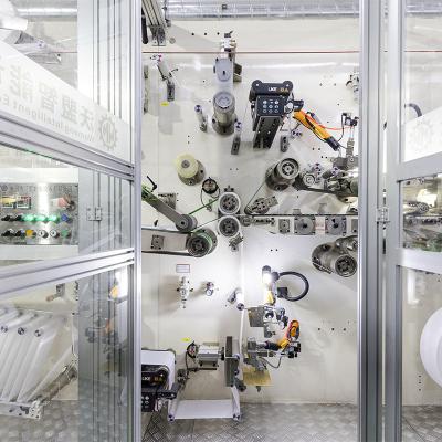 中国 CE ISO 1200PCS/MIN 生理用ナプキン製造 PLC フルコントロール インテリジェント操作 販売のため