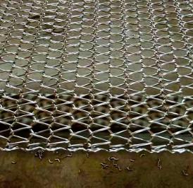 Cina Industria alimentare su misura Diamond Mesh Steel Plate Conveyor Belt in vendita