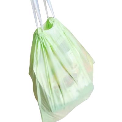 China Sacos de lixo de corda de tração compostáveis personalizáveis com caixa de distribuição de varejo à venda
