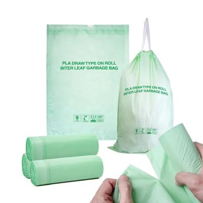 China Sacos de lixo de corda de tração compostáveis personalizáveis com caixa de distribuição de varejo à venda