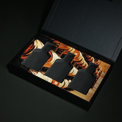 Cina Scatola regalo di lusso in cartone nero opaco per tre bottiglie di vino in vendita
