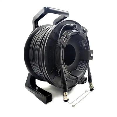 Cina Cavo portatile in fibra ottica, rimorchio a tamburo, connettore impermeabile, bobina in fibra ottica in metallo e plastica in vendita