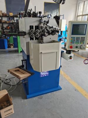 China der CNC-220V Äxte Frühlings-Maschinen-zwei mit maximalem 550pcs/minimaler Produktion beschleunigen zu verkaufen