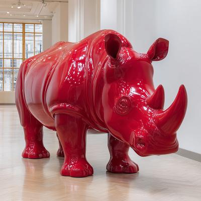 China Red Rhinoceros Animal Fiberglass Resin Statues For Shopping Mall Decoration for sale