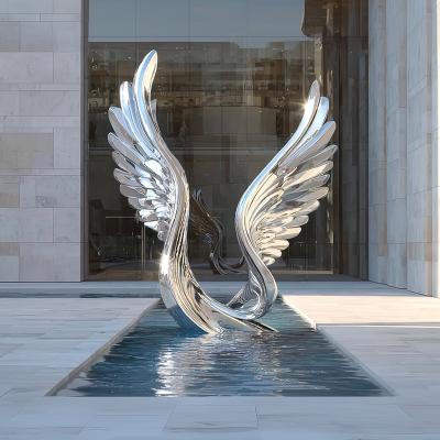 China Mirror Polished Metal Soaring Wings Sculpture Decorative Art for Hotel Lobby for sale