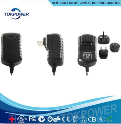 China 12V 1.5A  US AU Interchangeable Plug Power Adapter / Universal AC DC Adapter for sale